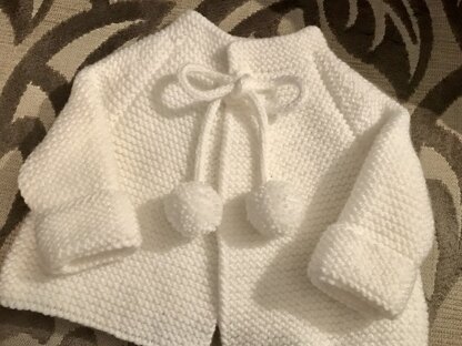 Thea Jacket - Knitting Pattern in MillaMia Naturally Soft Aran | LoveCrafts