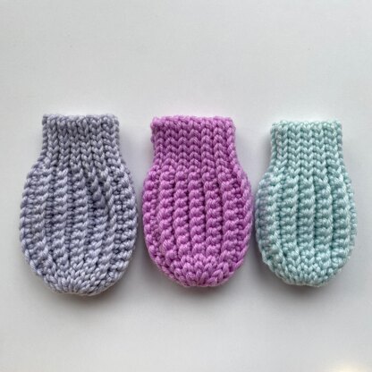 Thumbless baby mittens store