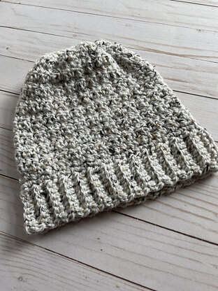 Tegan Baby Hat with Top Knot Knitting pattern by Julie Taylor | LoveCrafts